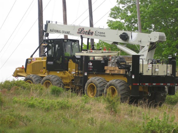 Caterpillar Forwarder als drager voor hijswerk